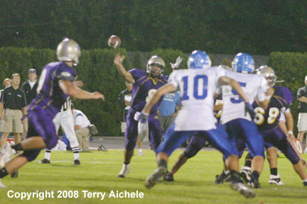 LEFT - Hermiston quarterback Faafiaula Ena lets fly with a pass during ...