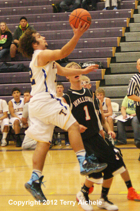 Saul Esquivel of Stanfield drives to the basket.LEFT [img_6507] - RIGHT ...