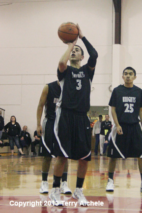 LEFT - Francisco Nunez of Irrigon shoots a free throw.[img_7095]RIGHT ...