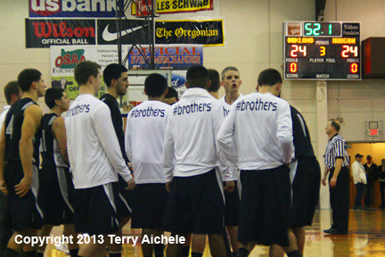 LEFT - Irrigon coach Jake McElligott gives the Knights their orders for ...