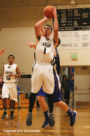LEFT - Adrian Romero of Irrigon shoots a short jump shot.[img_7748 ...