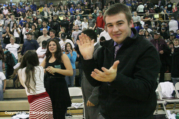 LEFT - Irrigon head coach Jake McElligott hugs Adrian Romero following ...