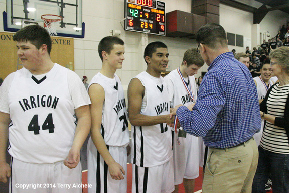 LEFT - Fredy Vera of Irrigon receives his medal.[img_70308]RIGHT - The ...
