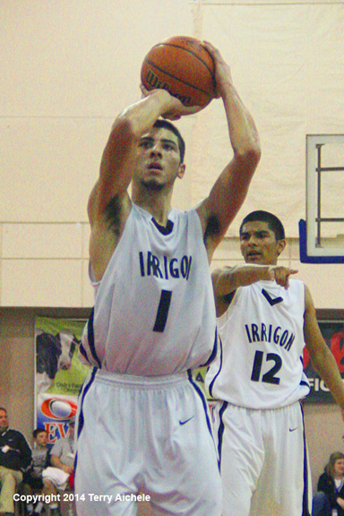 LEFT - Adrian Romero of Irrigon, in white, prepares to shoot a ...